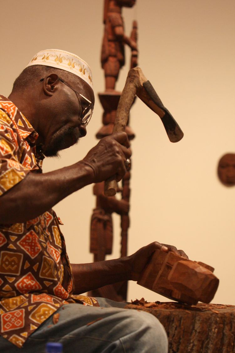 Traditional Sculptor, Lamidi Olonade Fakeye, at work, Ibadan, Nigeria.